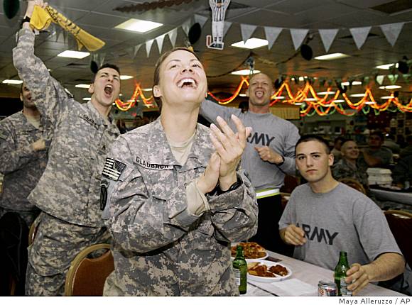 Troops in Iraq enjoy the game, and their beers