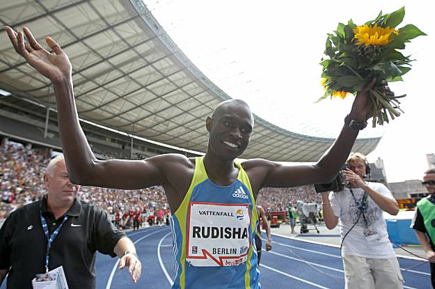 Kenyan warms to task, runs world-record 800