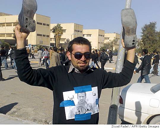 Accused Bush shoe-thrower to face judge today