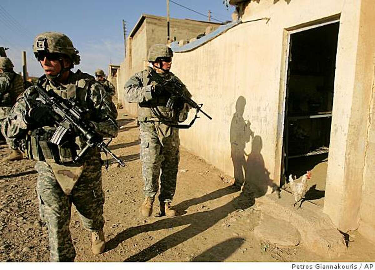 Iraqi soldier kills 2 GIs, wounds 6 at outpost