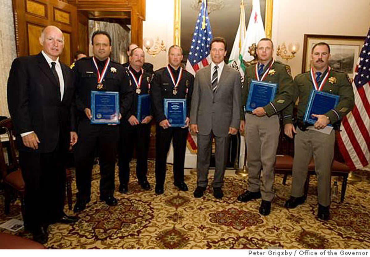 Two Fremont police officers honored for saving woman from fire