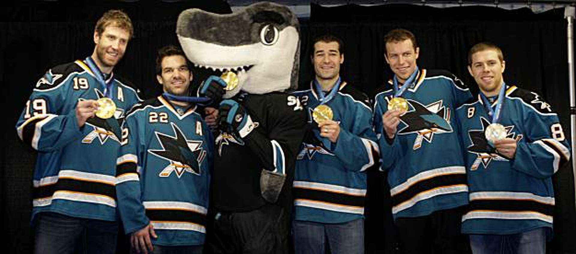 Sharks Olympians return, show off their spoils