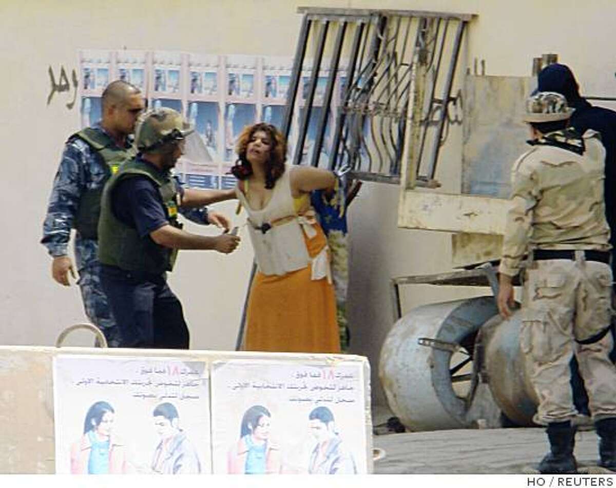 Iraq police display video of girl in bomb vest
