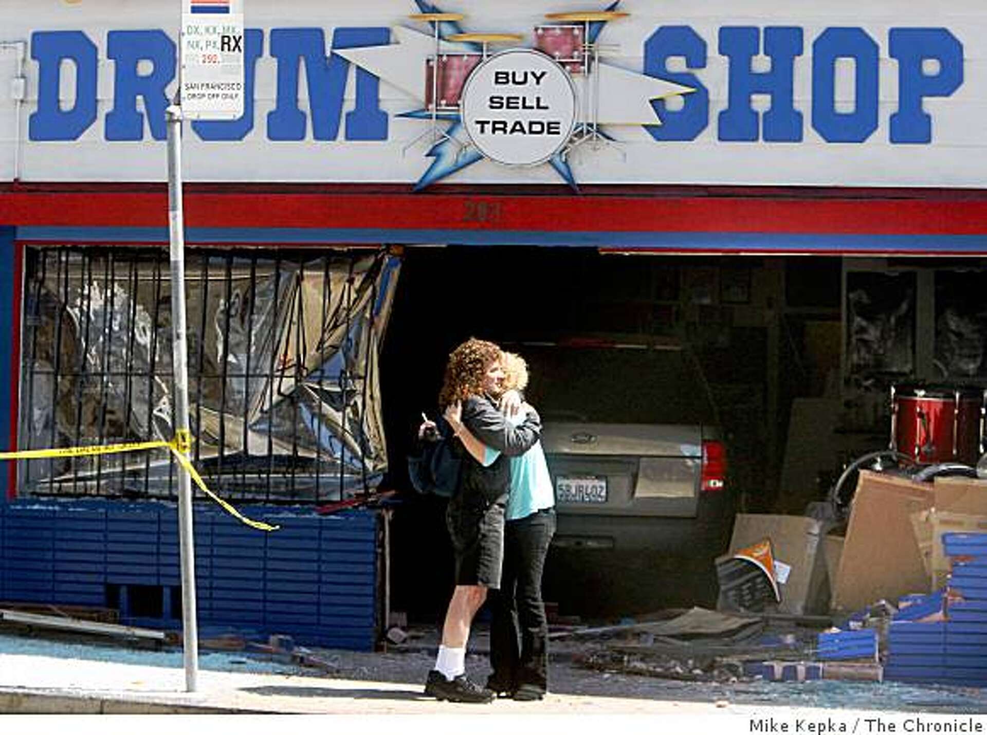 SUV rolls into antique drum store - no one hurt