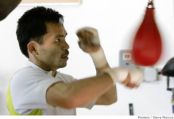 Popular Filipino 'Pacman' favored to make boxing history