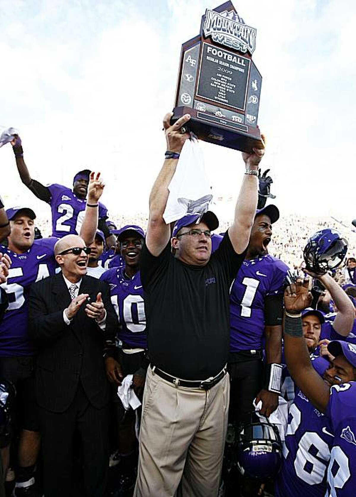 Strangely, TCU coach doesn't favor playoff