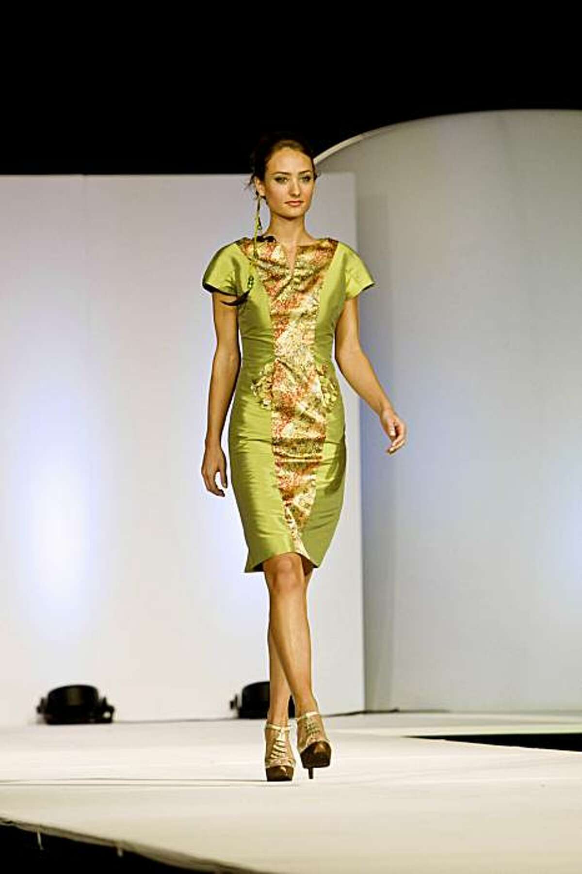 Catwalk gleams with Lily Samii's glossy gowns