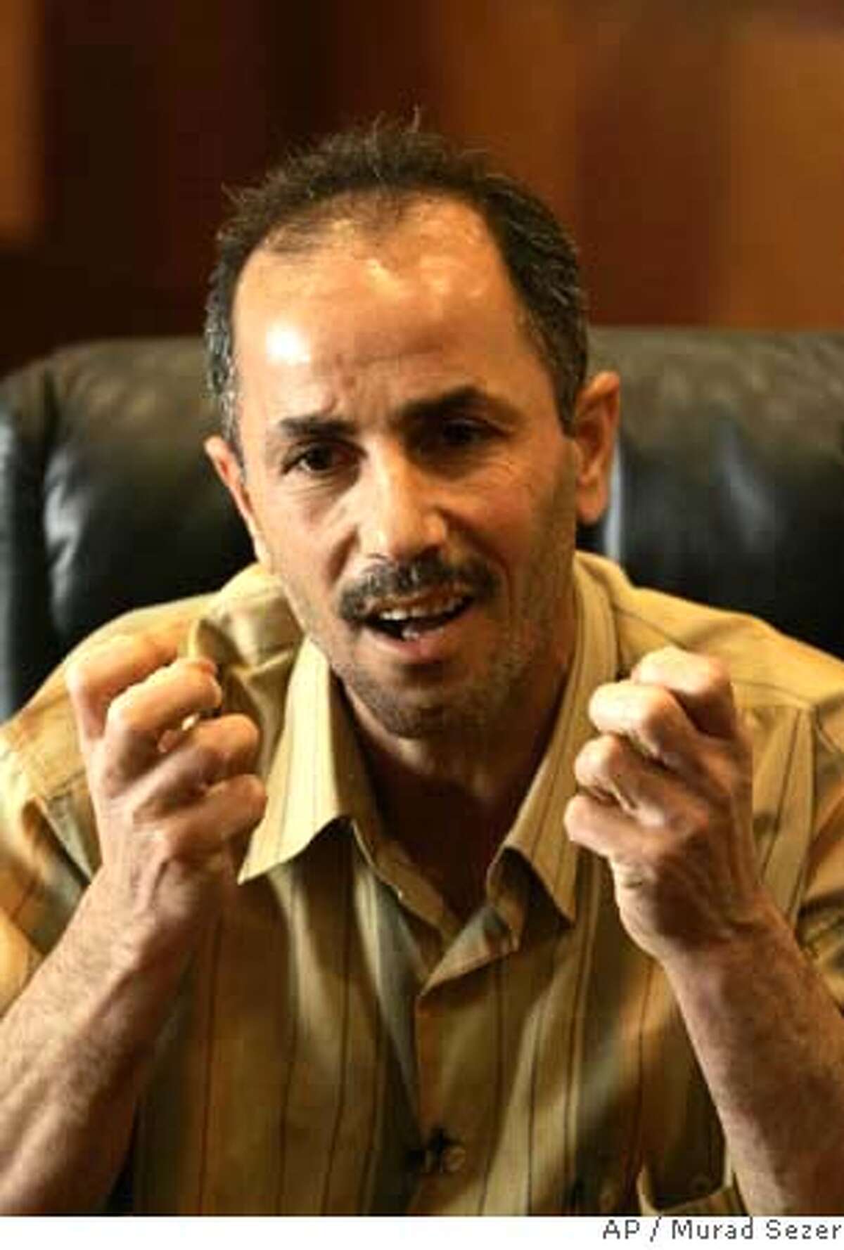 Iraqi sues U.S. firms over Abu Ghraib treatment