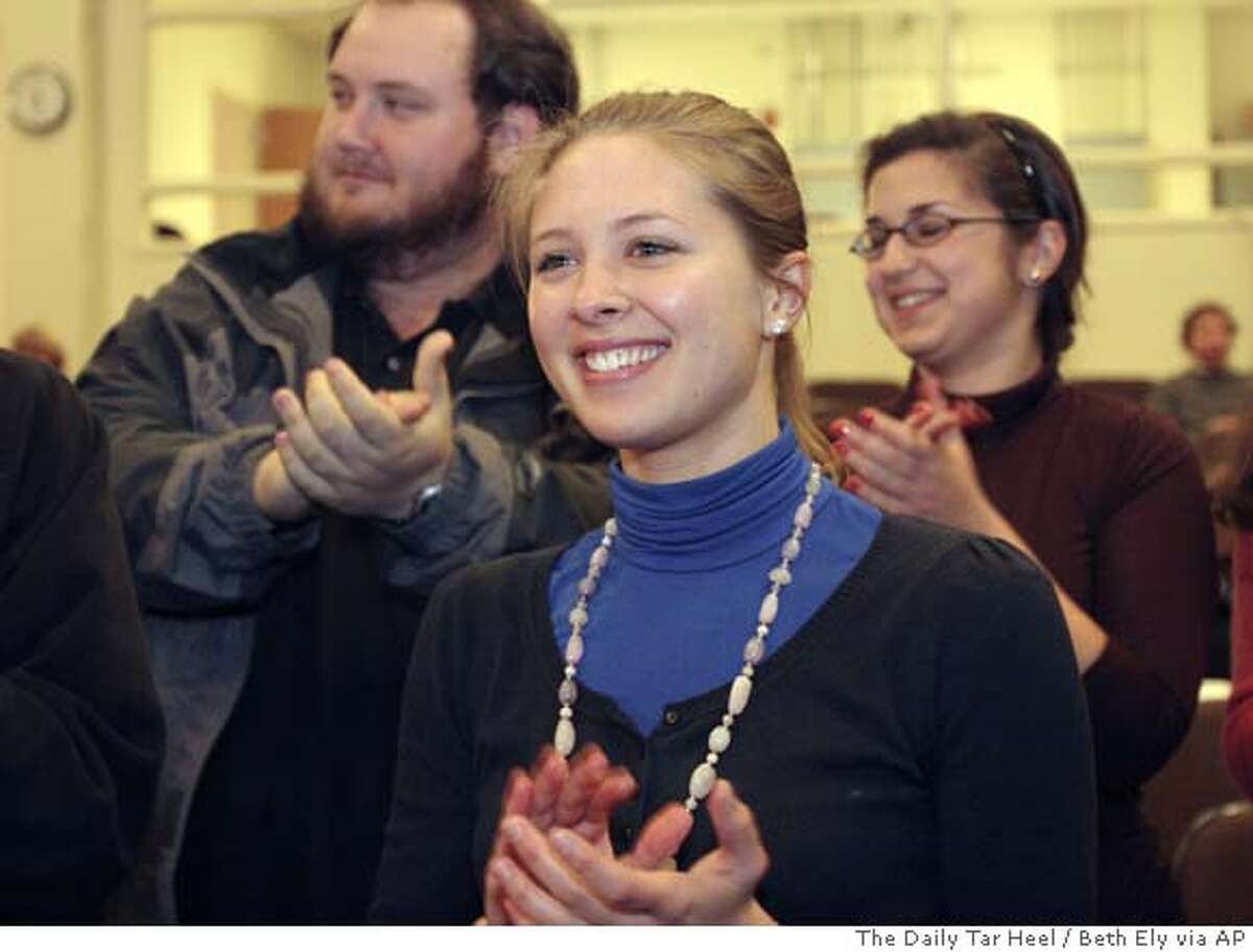 2 charged with murder in slaying of student leader