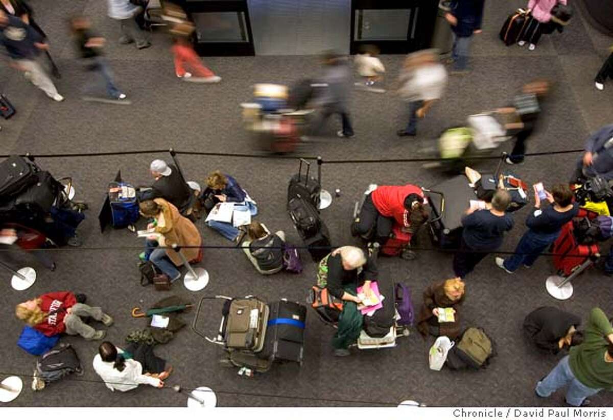 United adds fee for some to check second bag