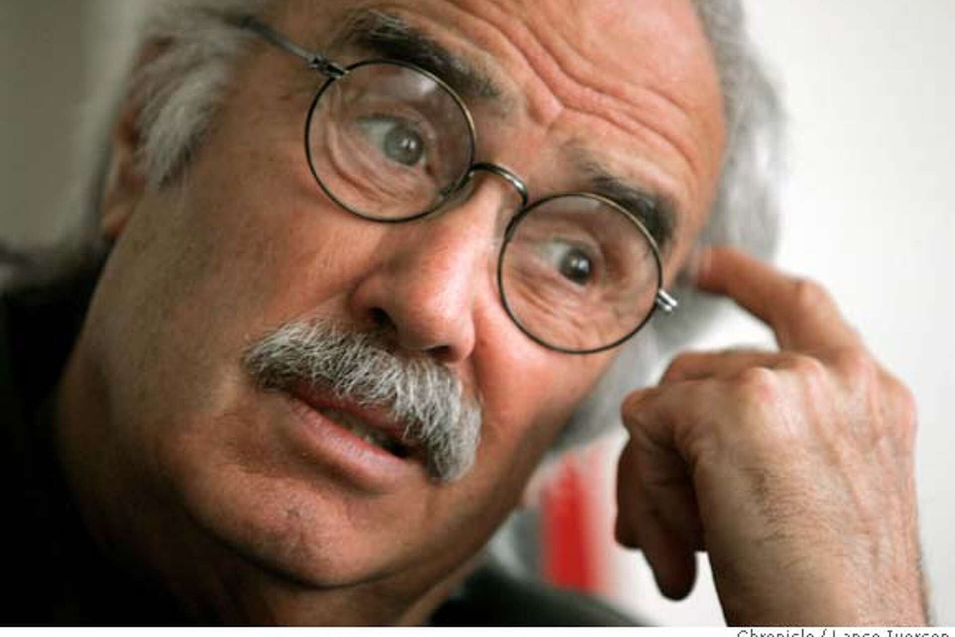 John Burton faces sexual harassment suit