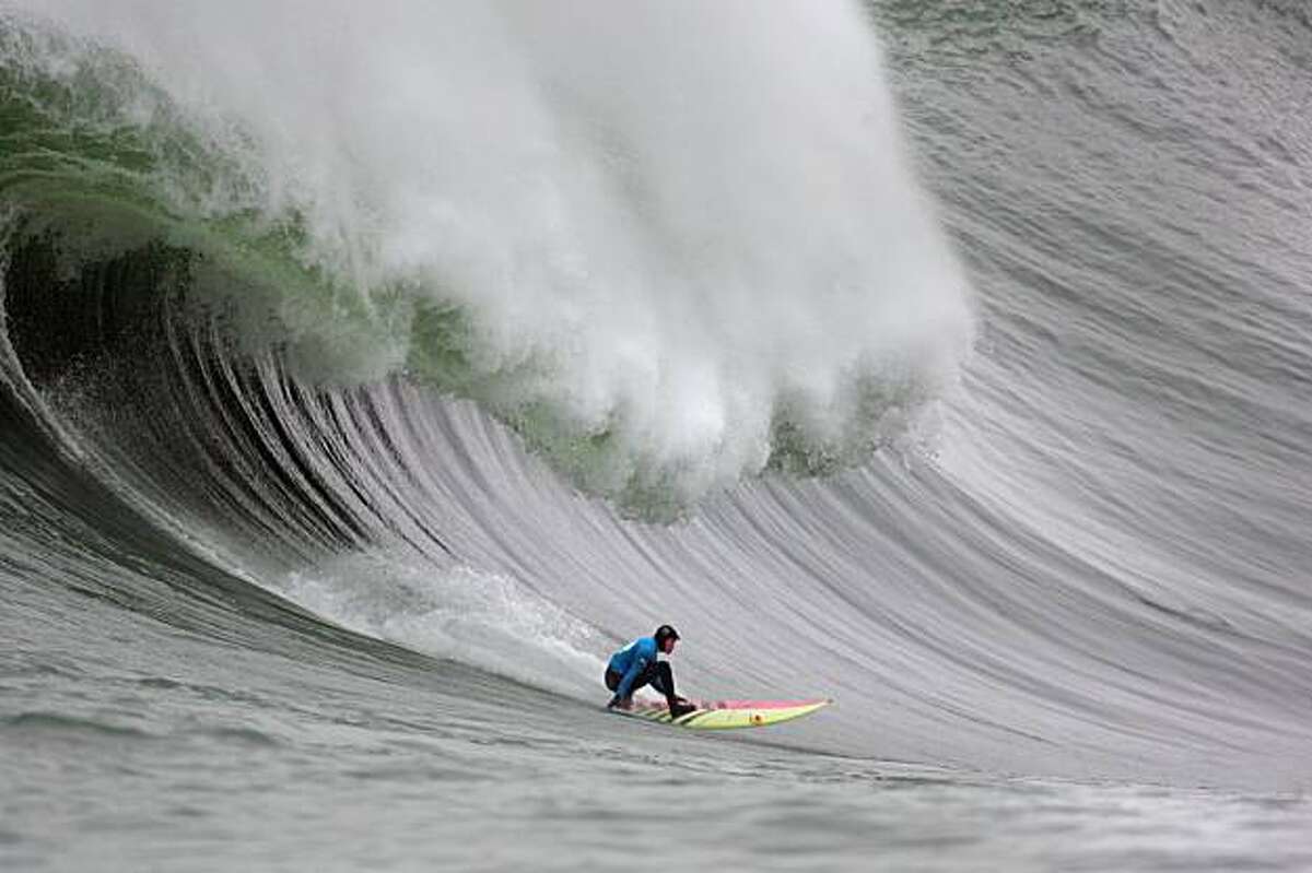 Surfers soar at Maverick's - fans cheer them on at beach, ballpark