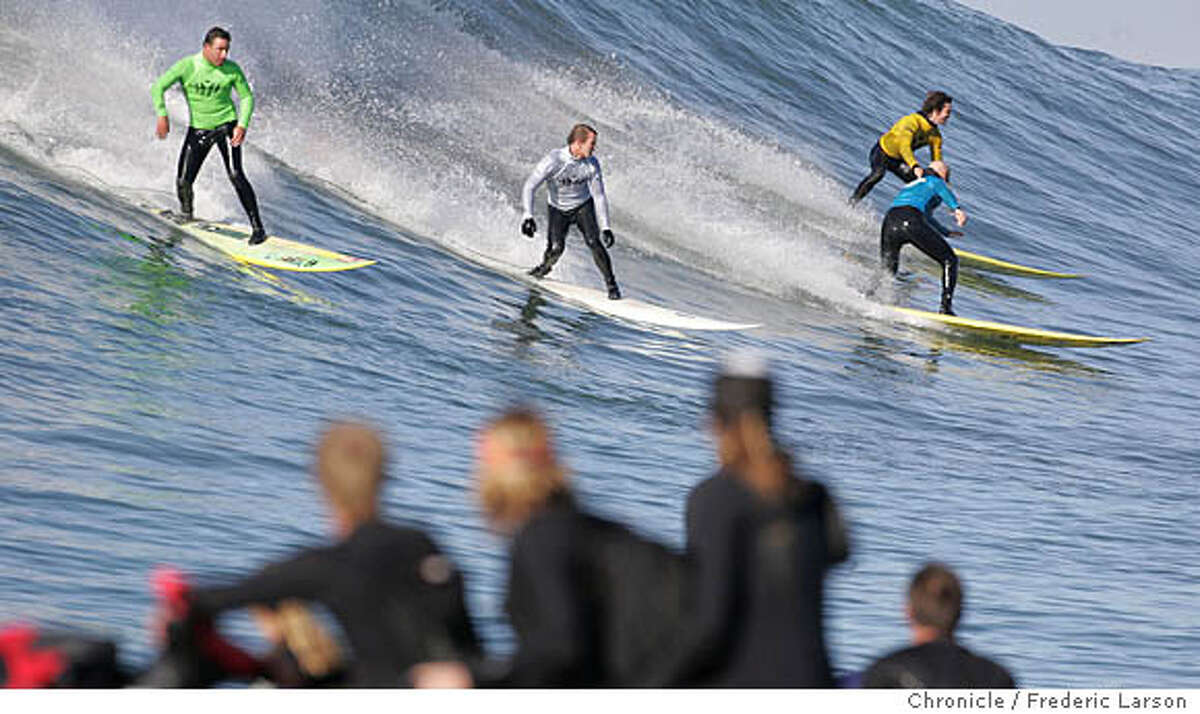 Surfers soar at Maverick's - fans cheer them on at beach, ballpark