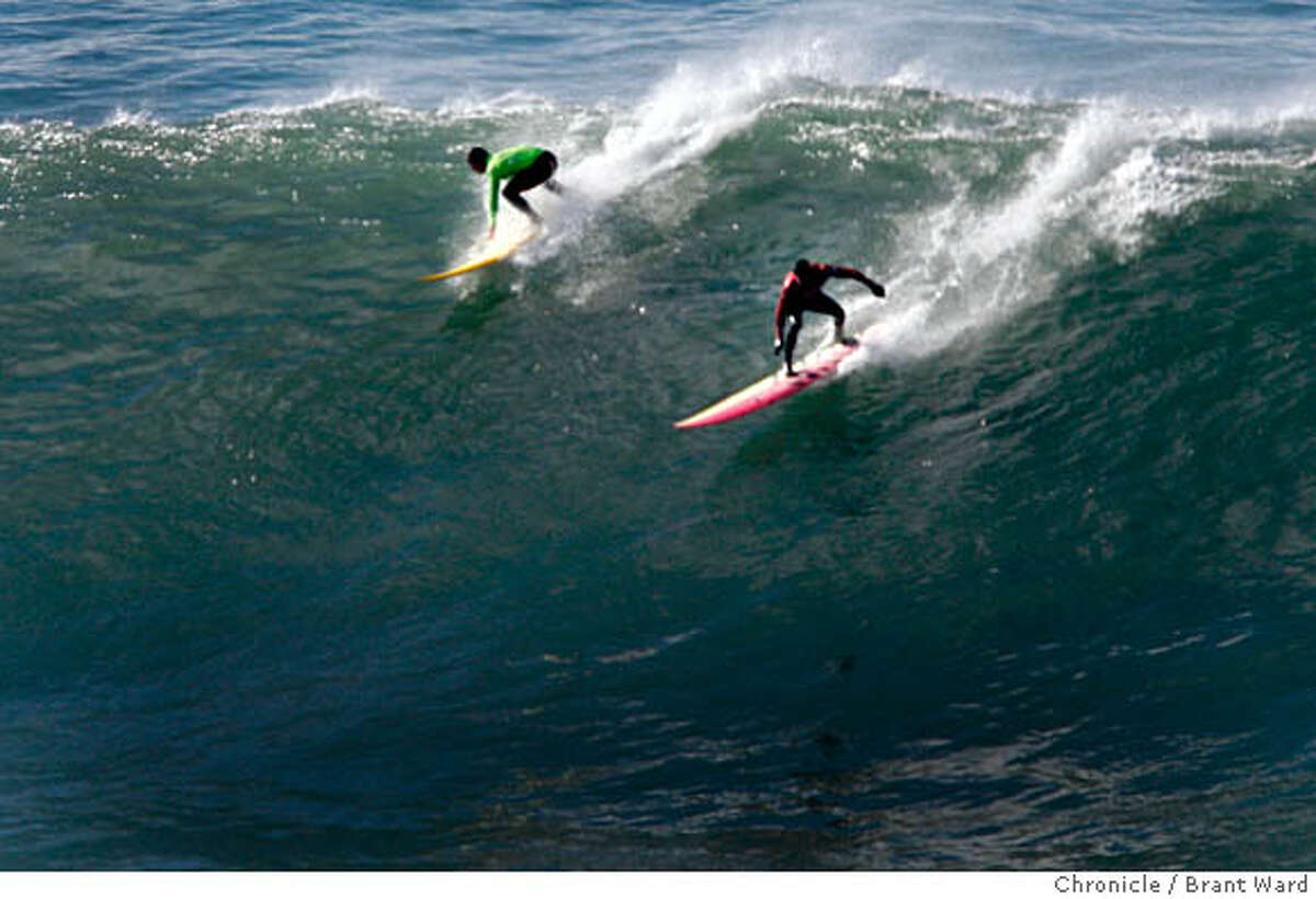 Surfers soar at Maverick's - fans cheer them on at beach, ballpark