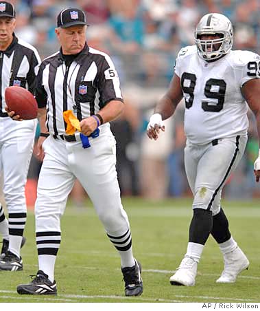 Sapp still gesturing, yelling, says he didn't touch official