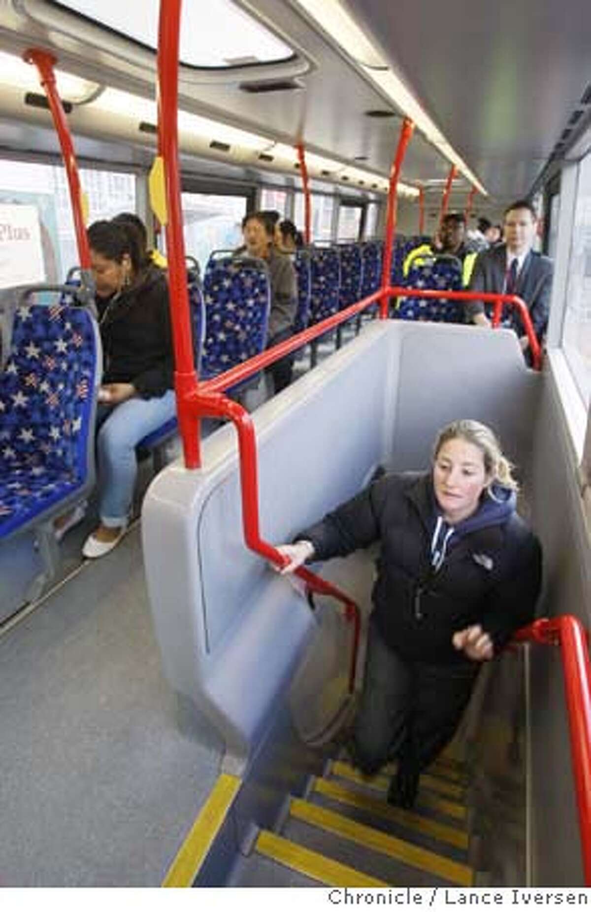 Riders give test of double-decker bus a high five