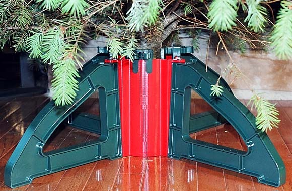 Stand secures a Christmas tree in seconds