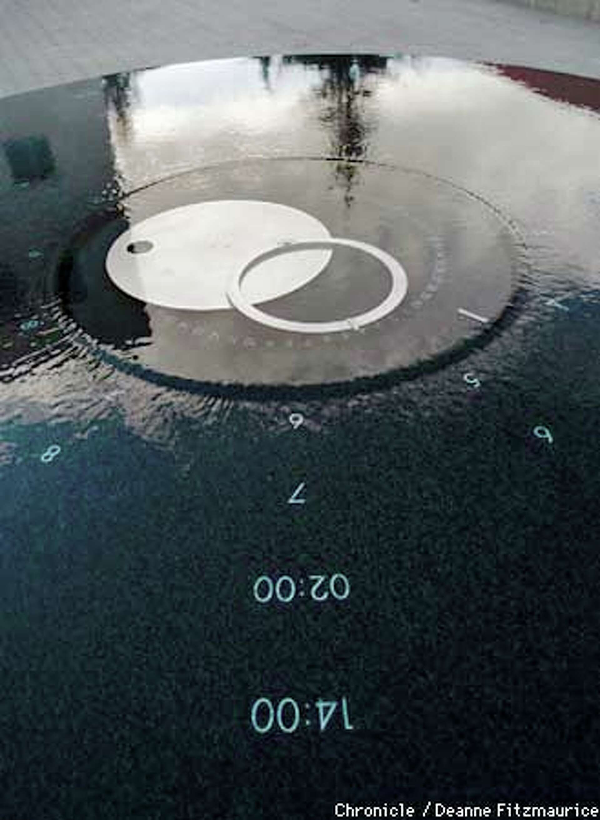 Carving Out Time / Architect Maya Lin designs a cryptic granite clock ...