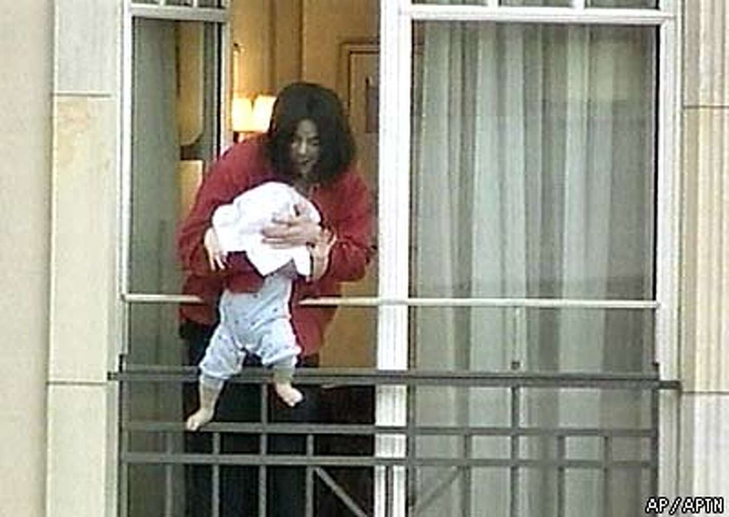 Michael Jackson's baby-dangling immortalized, plus Dixie Chicks, Colin ...