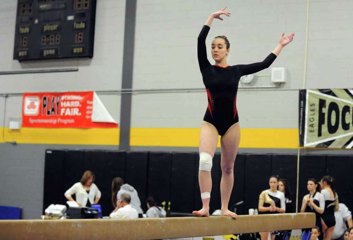 Wilton wins FCIAC gymnastics title; freshman McCaffrey stars for GHS