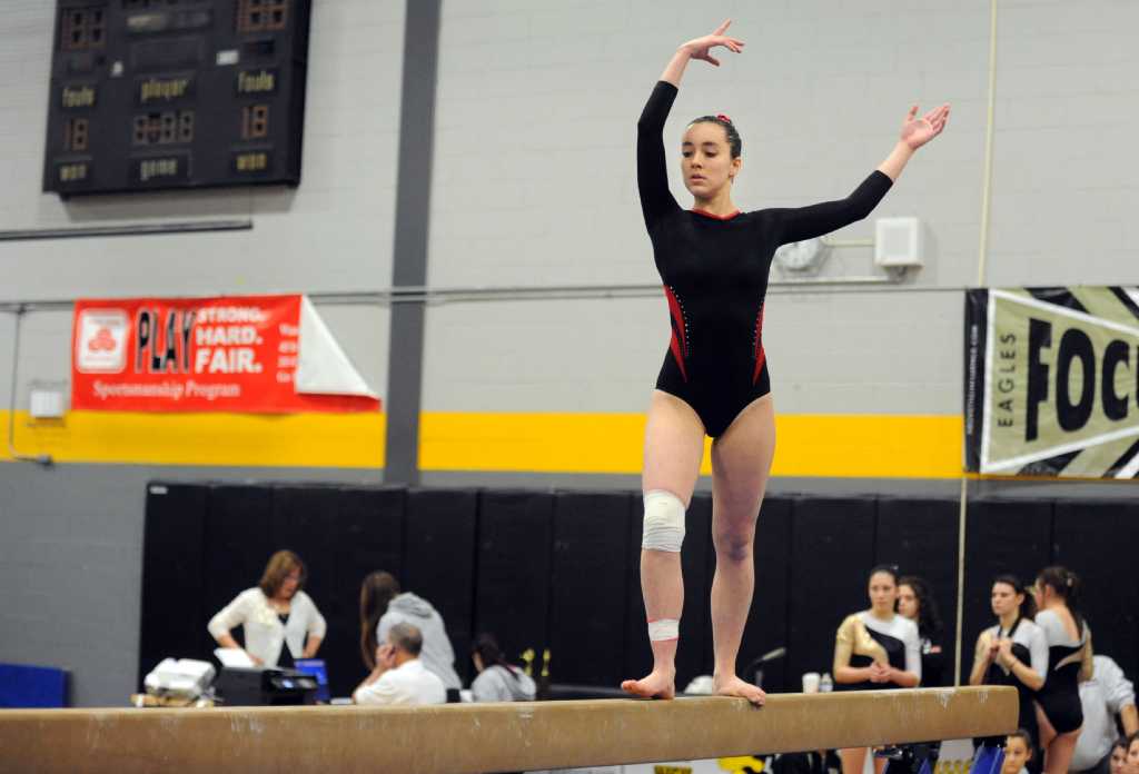 Wilton wins FCIAC gymnastics title; freshman McCaffrey stars for GHS