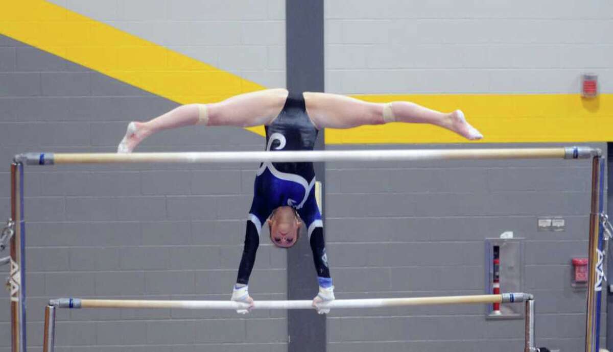 Wilton wins FCIAC gymnastics title; freshman McCaffrey stars for GHS