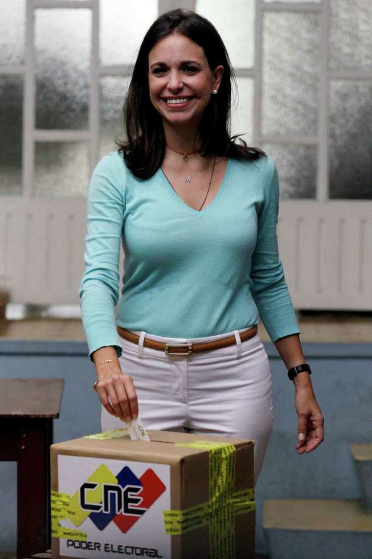 Venezuela's opposition chooses Chavez's challenger