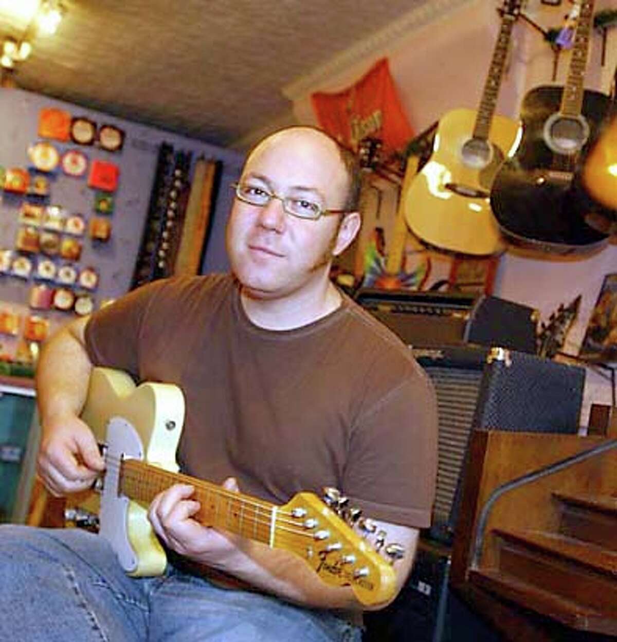 More Than Backup / Guitarist Adam Levy moves out from behind Norah ...