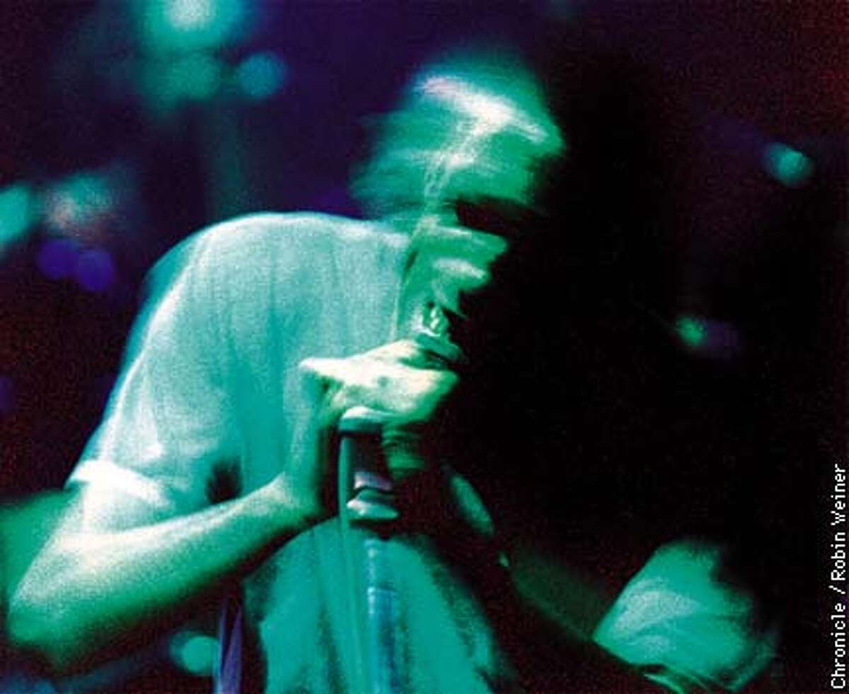 Portraits of the Artists / Photographers look for the clues that tell a ...