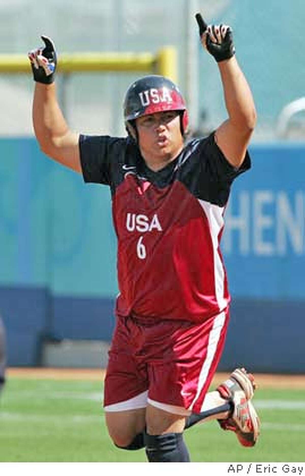 No mercy / Dominant U.S. captures gold with 79th straight win