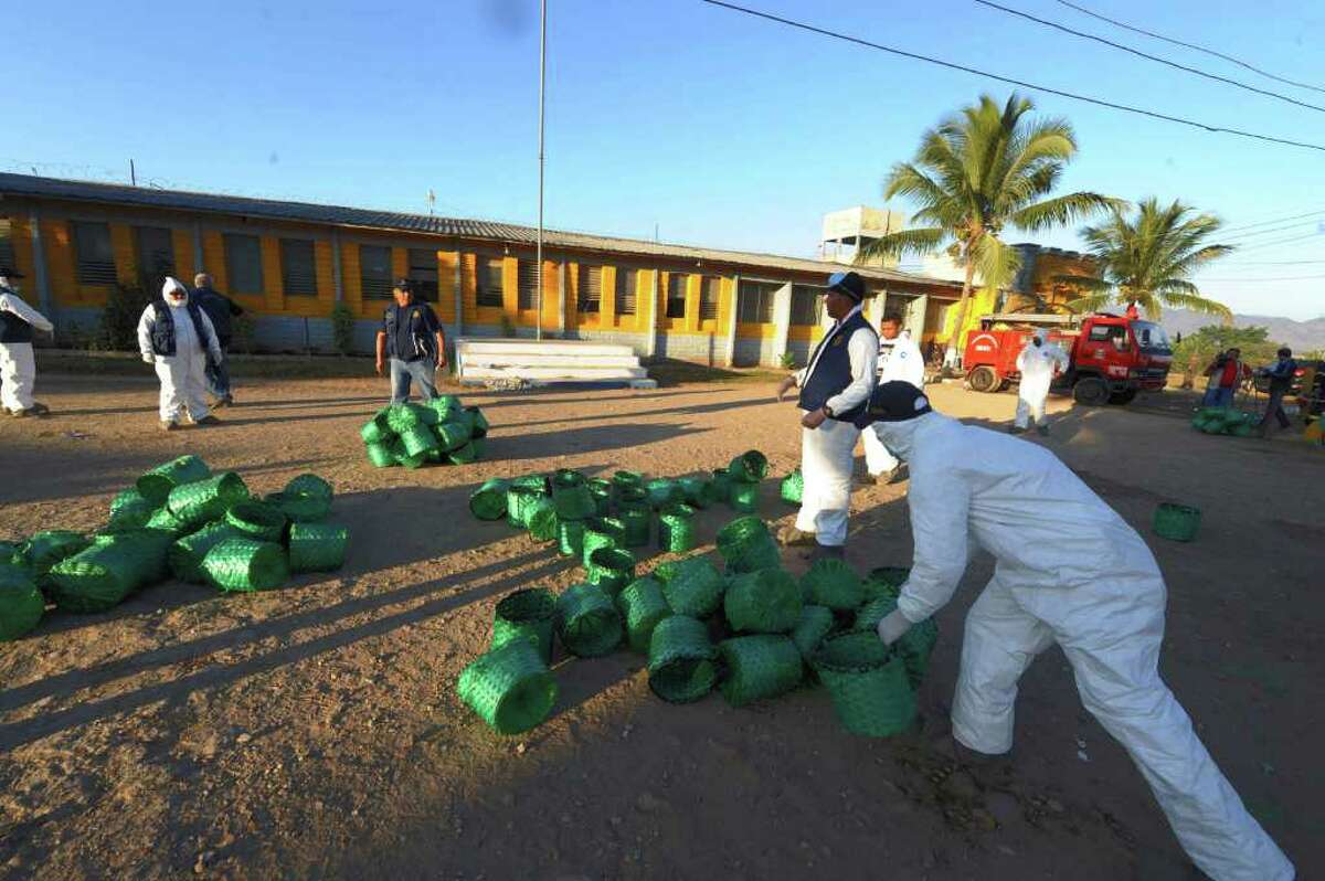 News of the world in photos: Hundreds die in prison fire