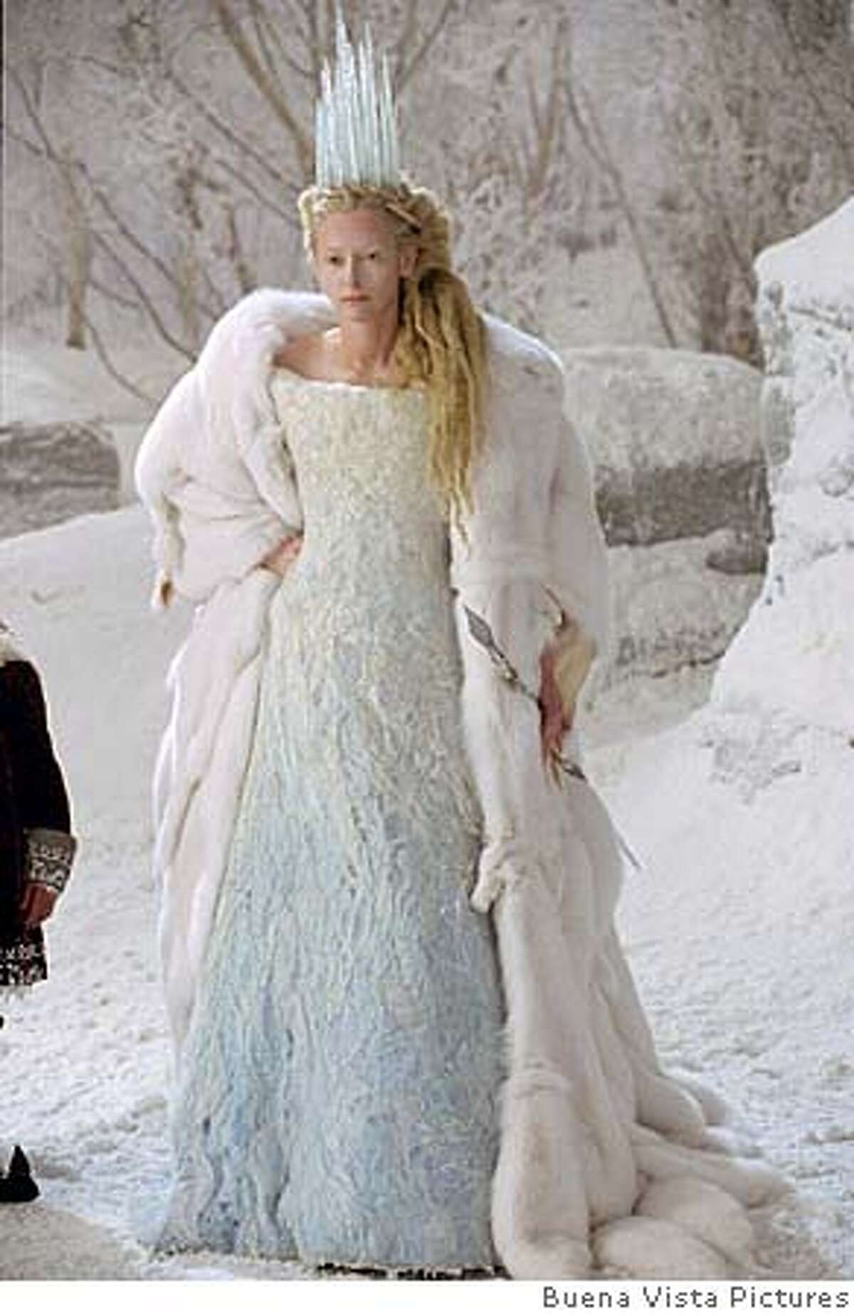 Children open a door and step into an enchanted world of good and evil ...