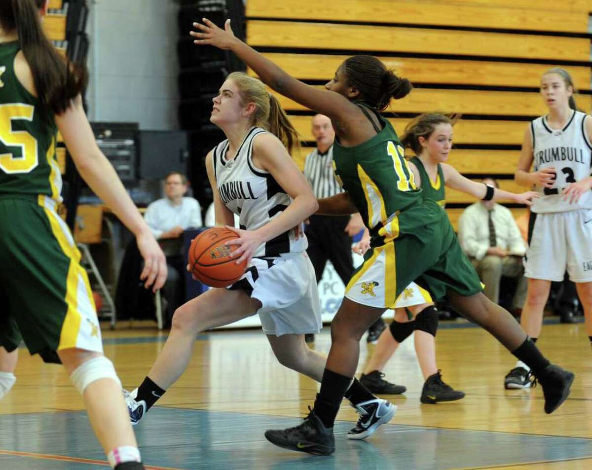 John Pfohl, Kolbe Cathedral boys basketball coach, puts family first.