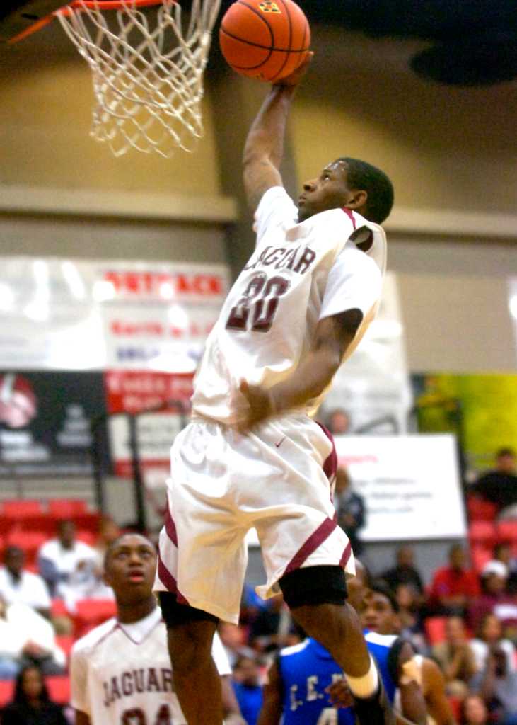 Timely dunk boosts Central boys in playoff win