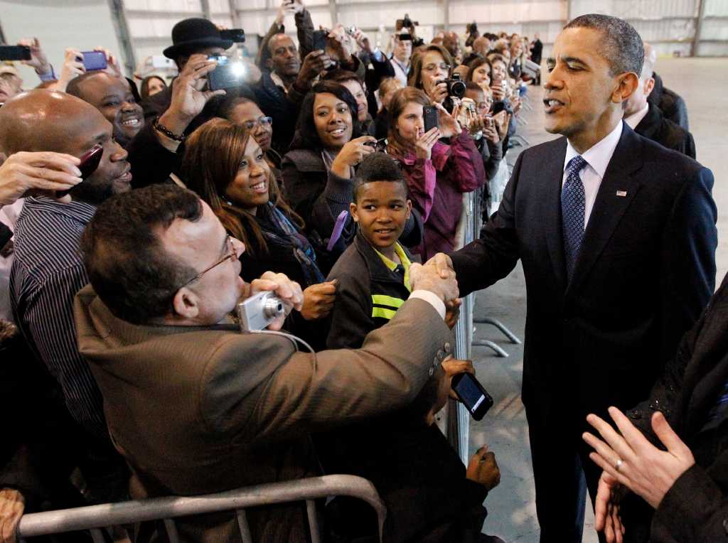 A rainy Houston welcome for Obama