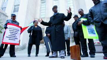 Attorney and community activist accused of illegal lawyering