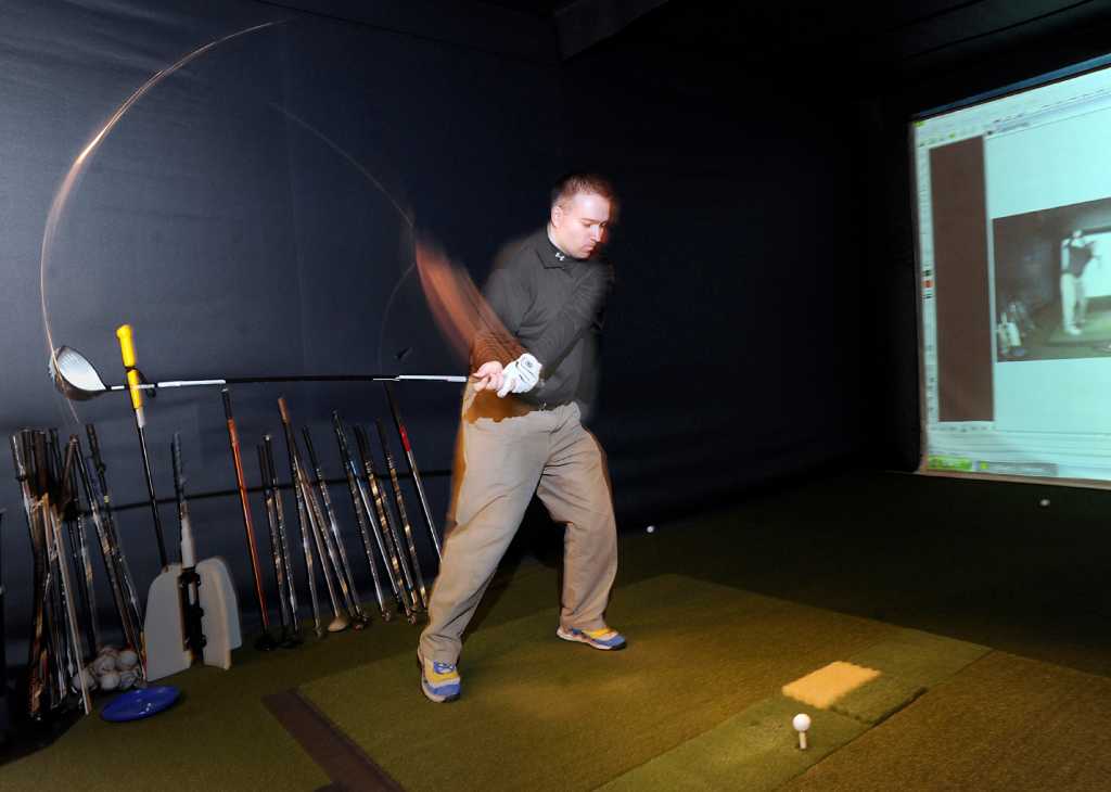 Back in the swing: Staff writer Neil Vigdor uses golf fitness guru's ...