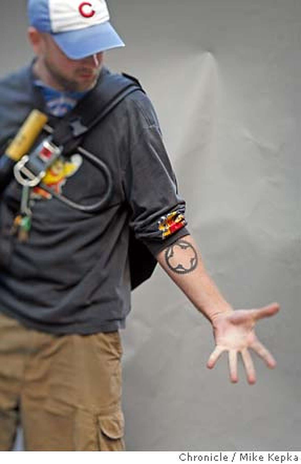 CRITICAL CLASS / Bike messengers sport cool clothes as they wend their ...