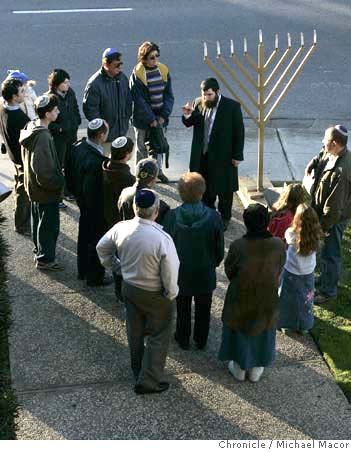 Damaged menorah restored, rededicated