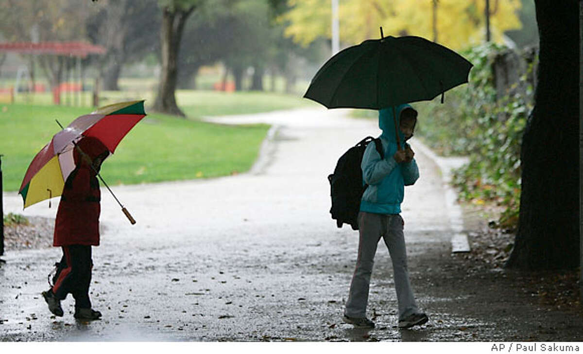 Downpours flood roads, delay flights