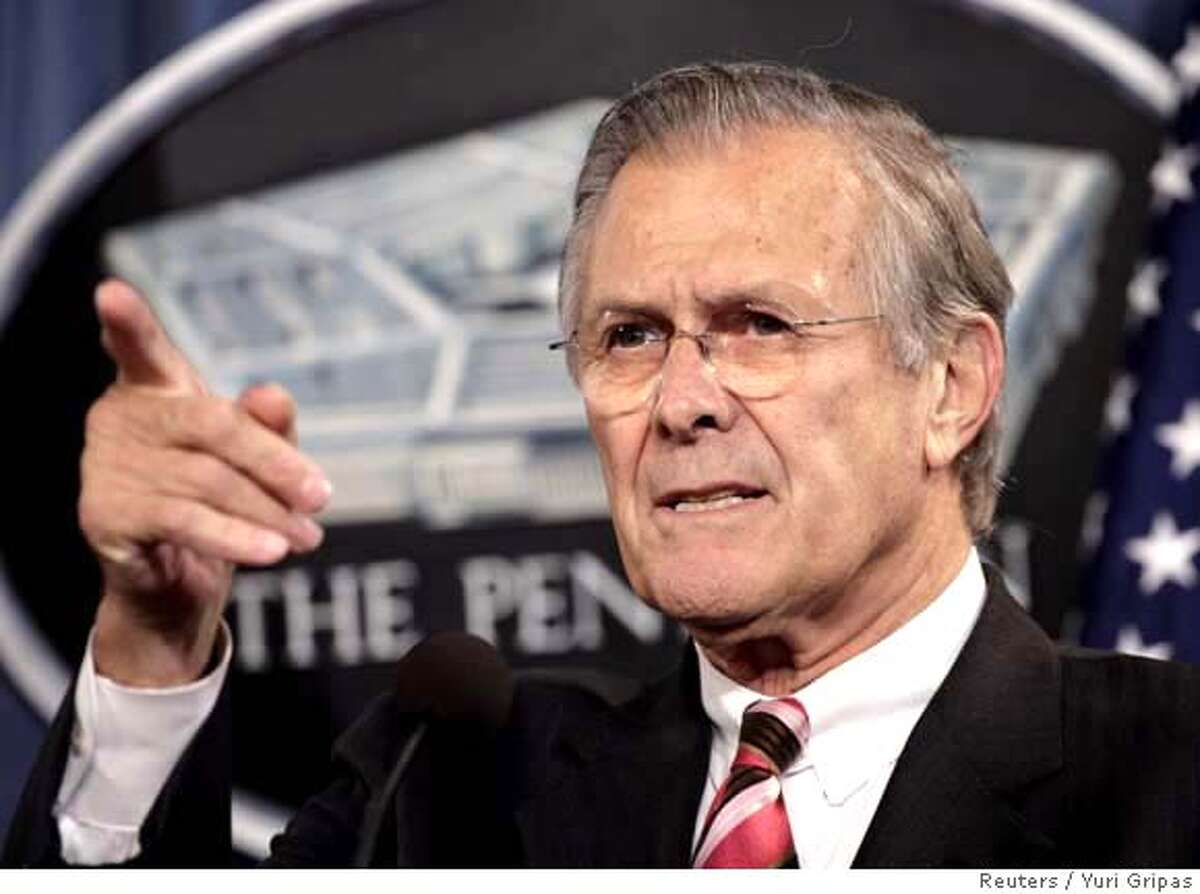 Rumsfeld switched stance in classified memo on Iraq / Two days before ...