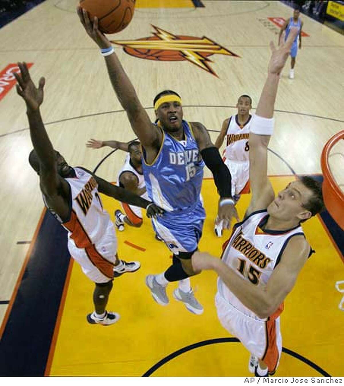 Too much 'Melo for Warriors / Nuggets get fast start, hold on at finish