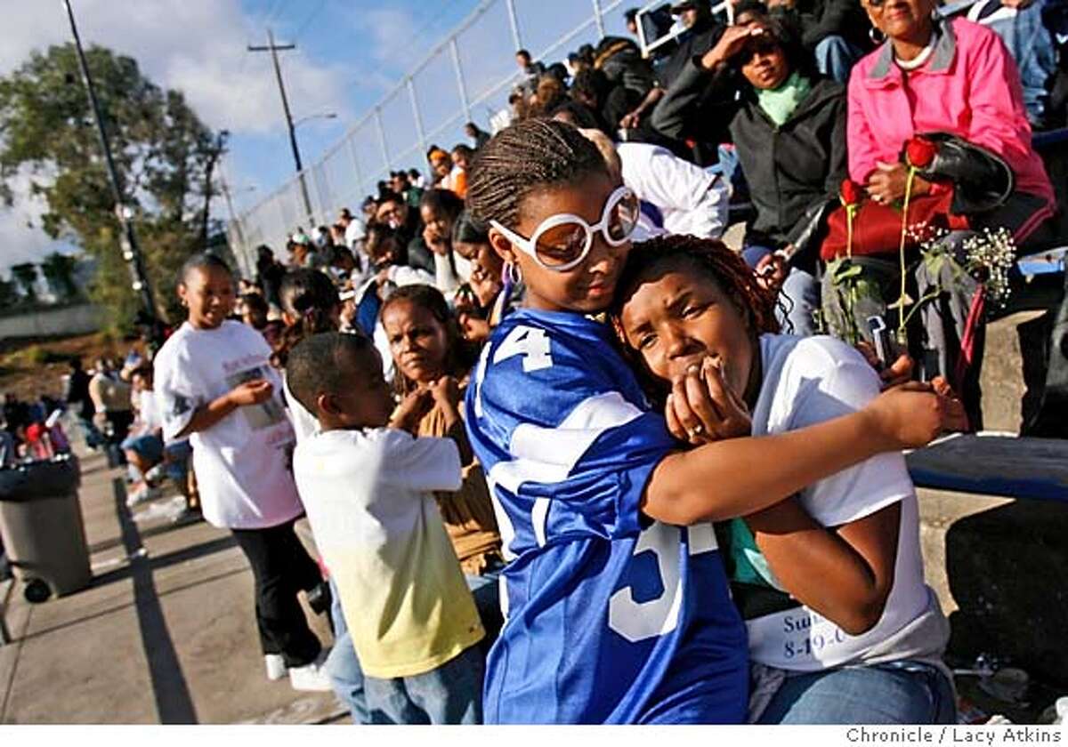 For the team's missing man / Oakland High's football squad honors ...