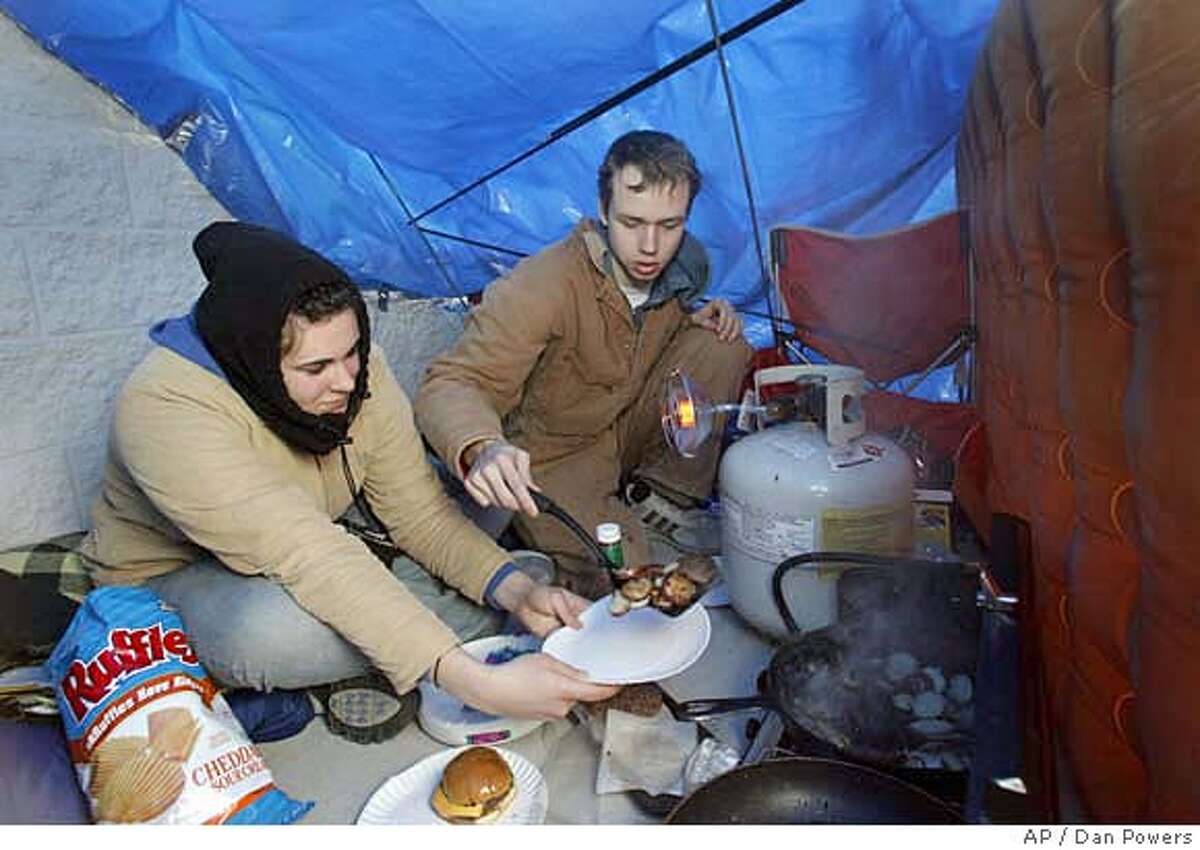 Big game hunting / Crowds line up at dawn for a chance to get Sony's ...