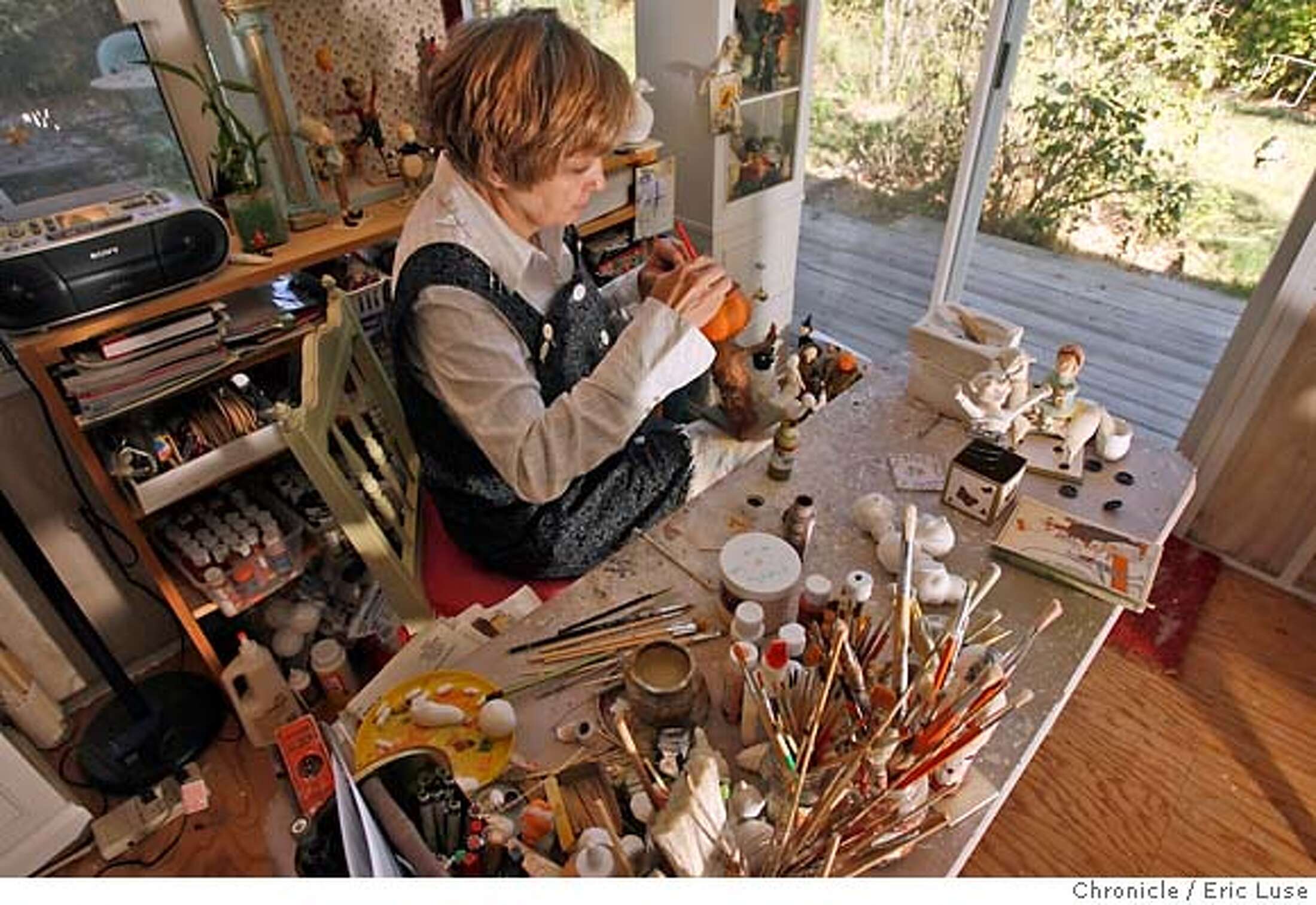 An old folk art revived / Melissa Tereck's witty papier-mache figures ...