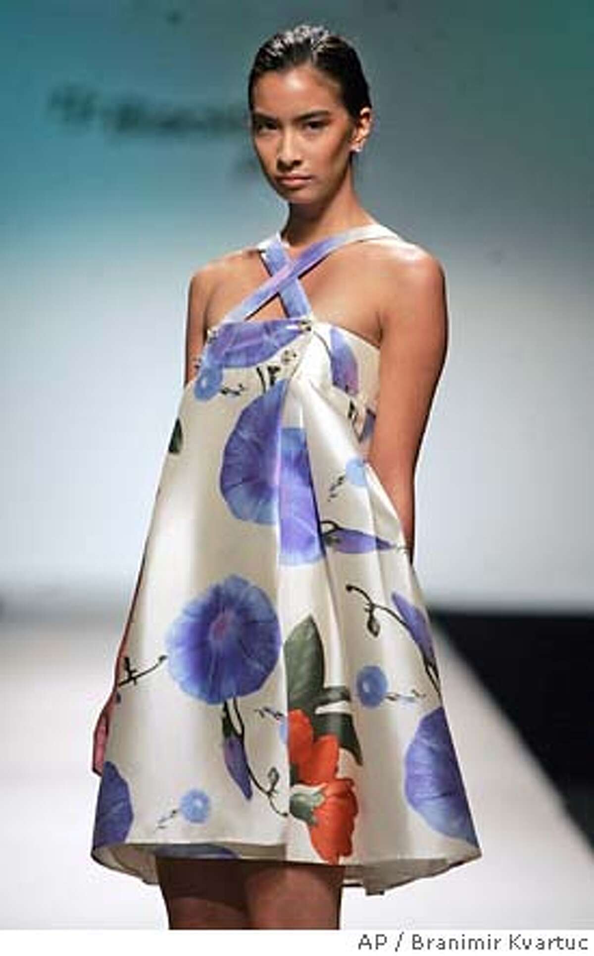 L.A. RUNWAY ROMANCE / Dresses, not jeans, are key to spring fashion