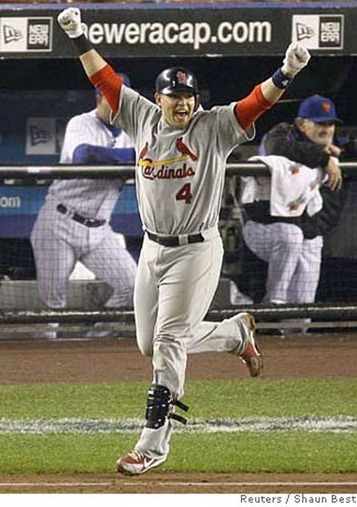 A WINNING CARD / Molina's HR in 9th sends St. Louis to World Series
