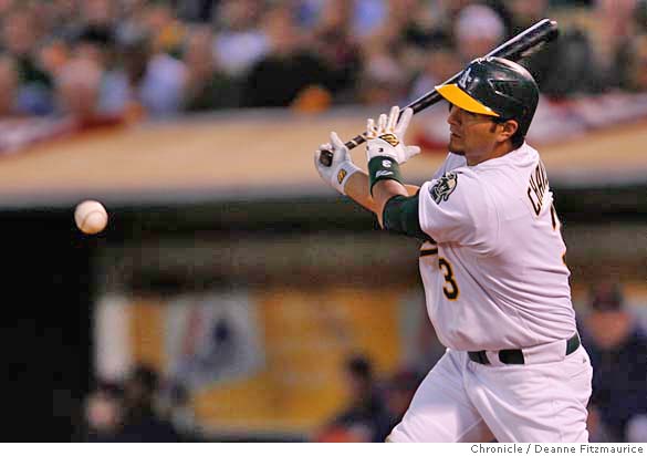 A struggle from the start / Chavez and A's find trouble at plate, in field