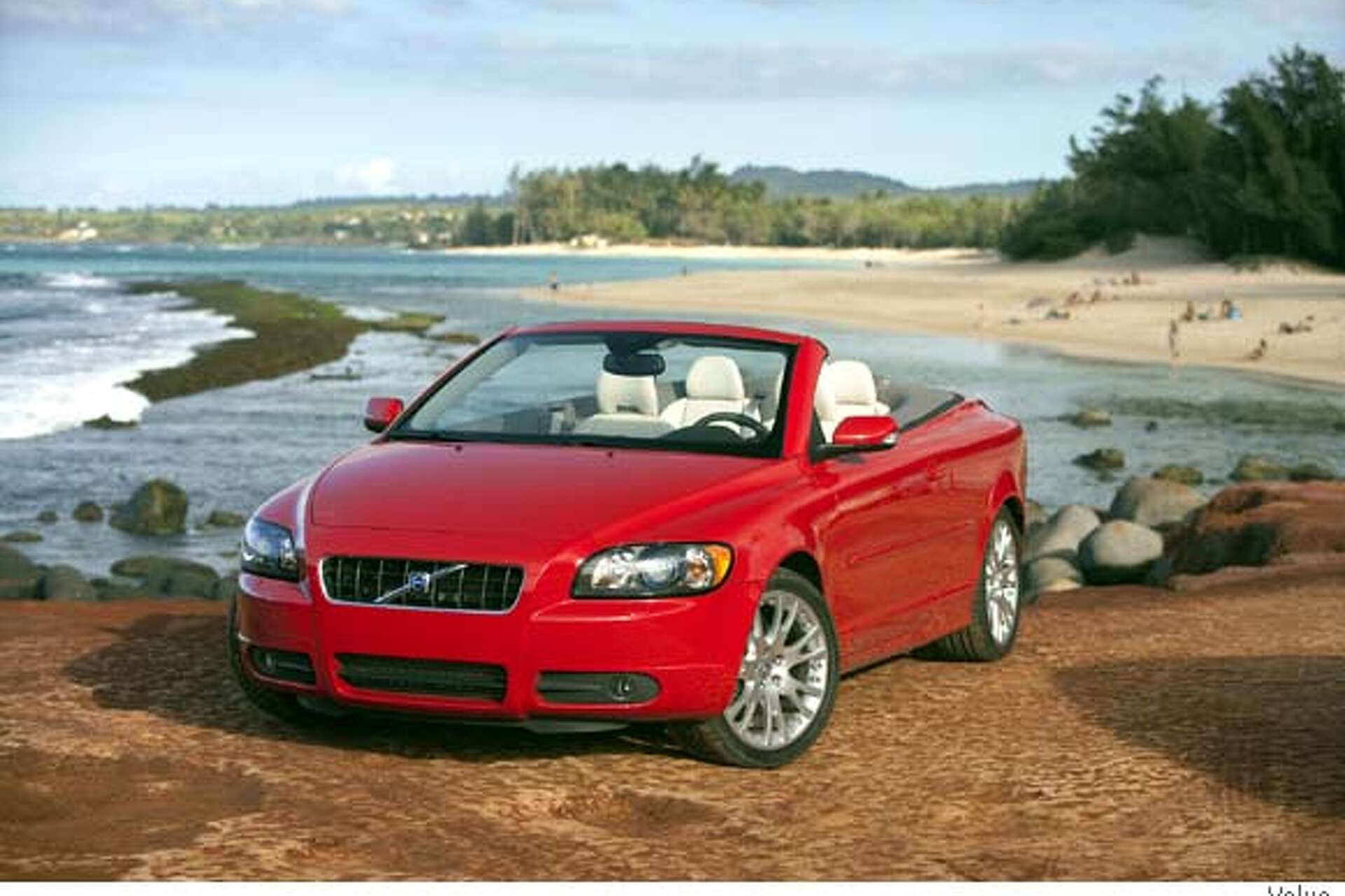 Volvo looks mighty good without a top / Retractable roof tucks away to ...