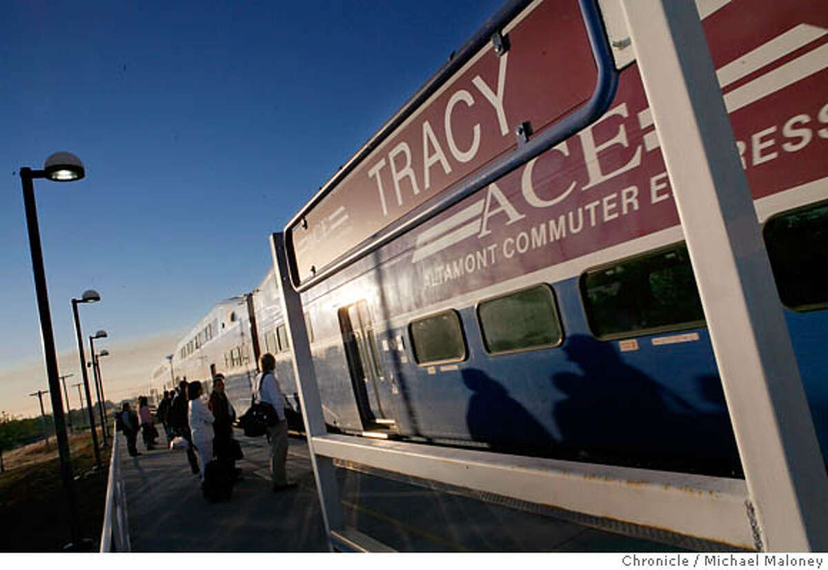 RIDING THE RAILS / Far-flung Bay Area towns hope commuters will hop out ...